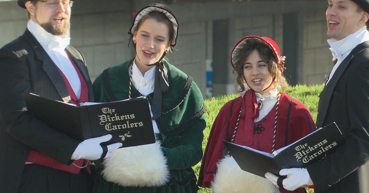 Christmas carolers share the holiday spirit - CBS News