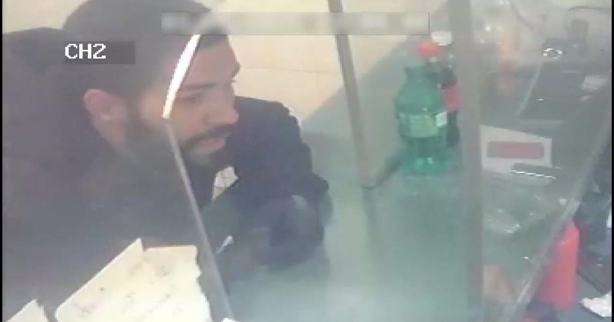 Massive manhunt after 2 cops shot in NYC - CBS News