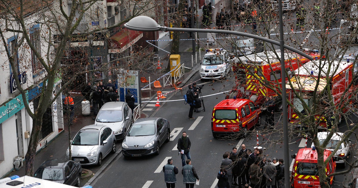 Police officer killed in shooting at Paris' edge, amid tension - CBS News