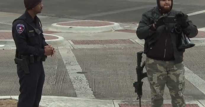 As groups police the police, some add guns to the mix - CBS News