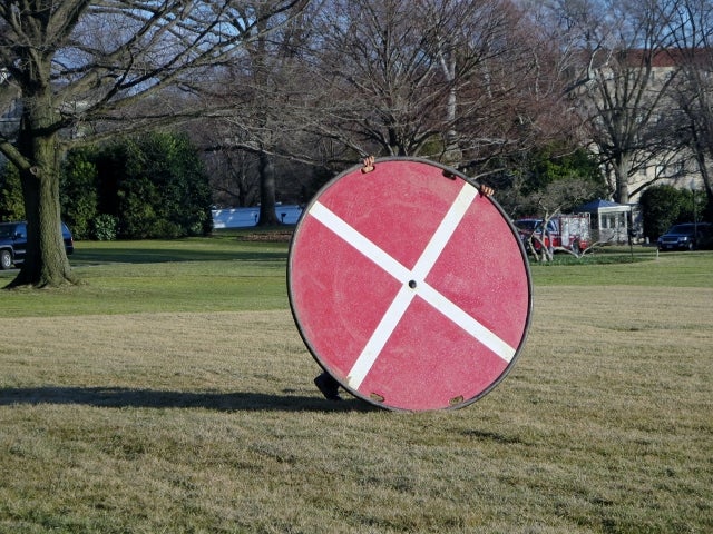 Why is there a big red coaster on the White House lawn? - CBS News
