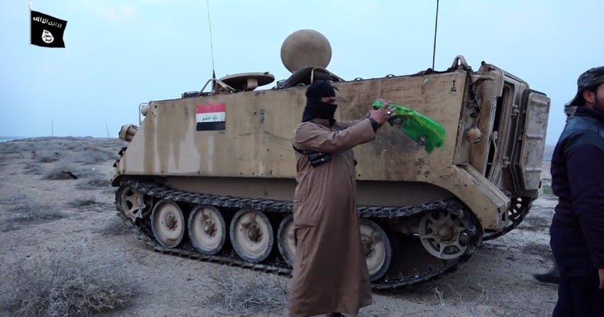 ISIS claims to seize weapons cache in Iraq - CBS News