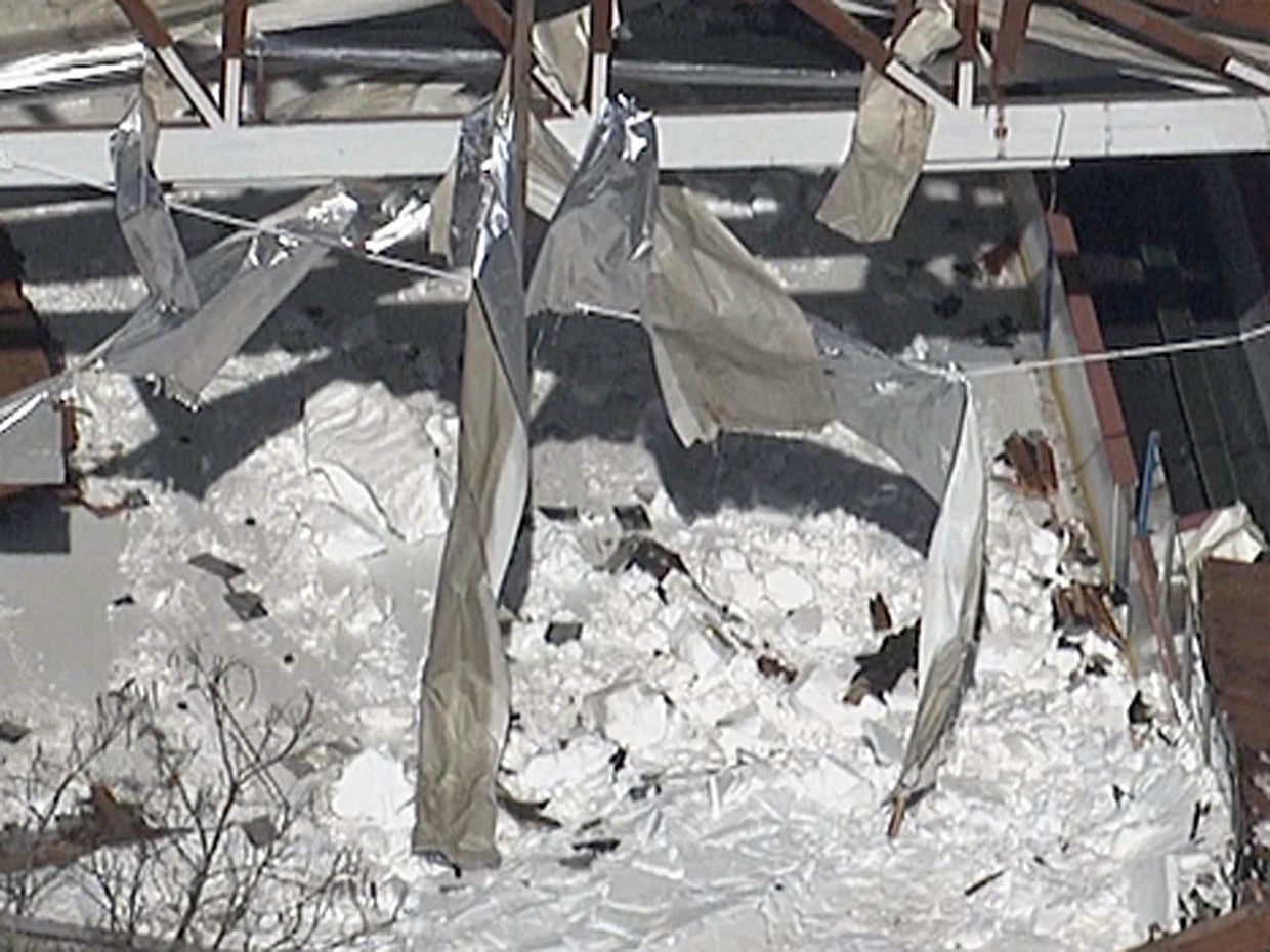 Ice rink roof collapses with youth hockey team inside - CBS News