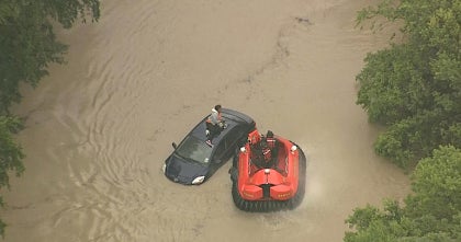 Dramatic flood rescues in Texas, Oklahoma - CBS News