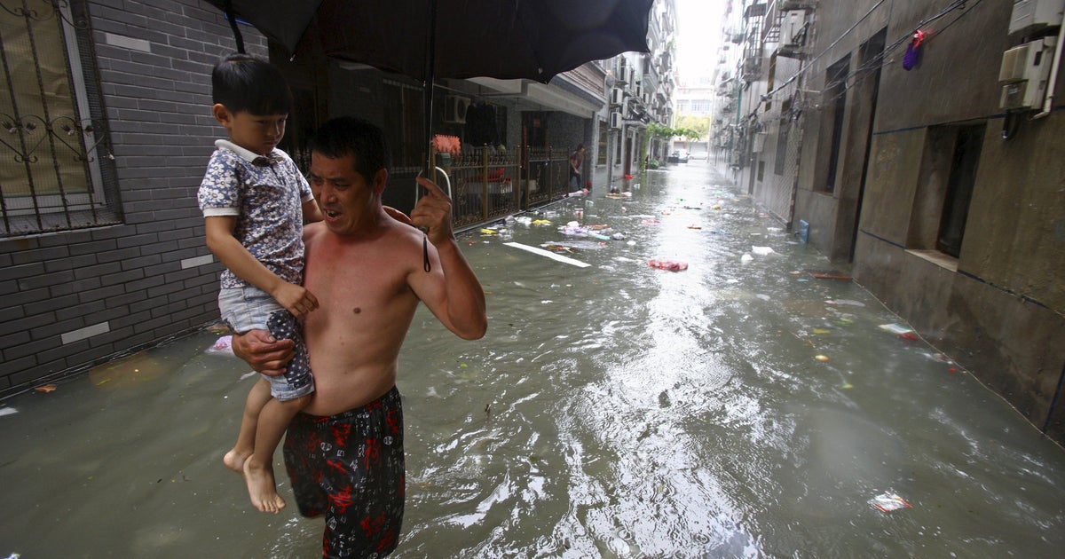 Typhoon that pounded China weakens into tropical storm - CBS News