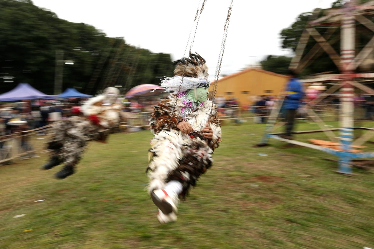 Dressing in feathers to honor a saint in Paraguay