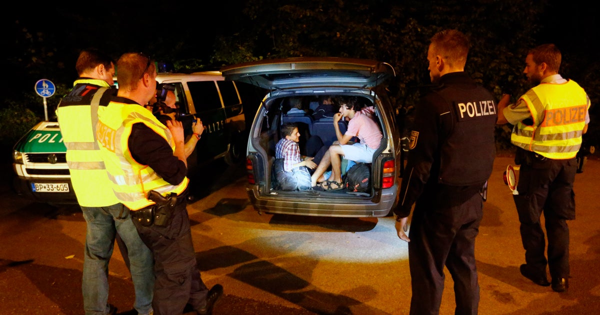 Germany implements temporary border checks to limit migrants - CBS News