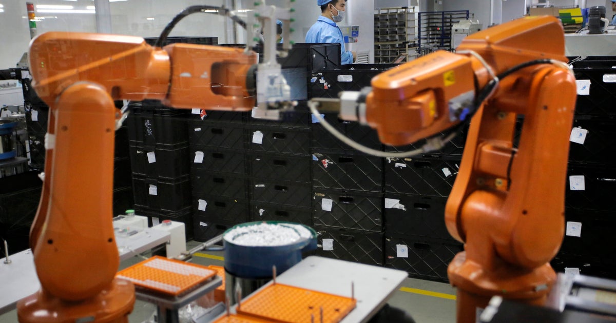 Robot revolution sweeping Chinese factory floors - CBS News