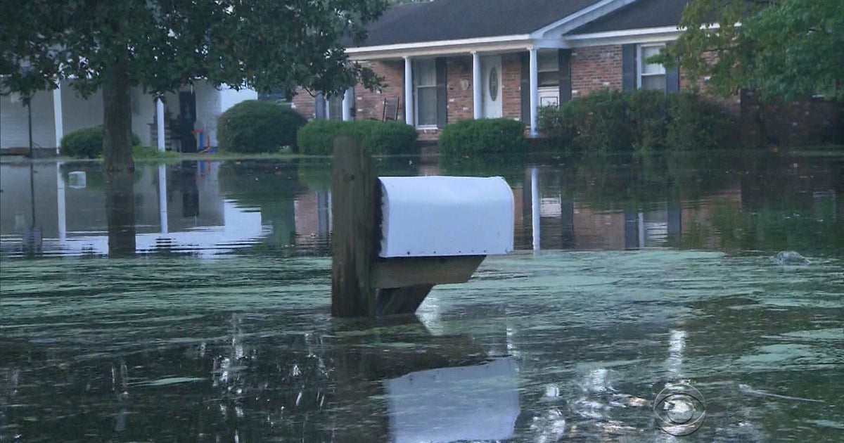 South Carolinians try to salvage their lives from record floods - CBS News