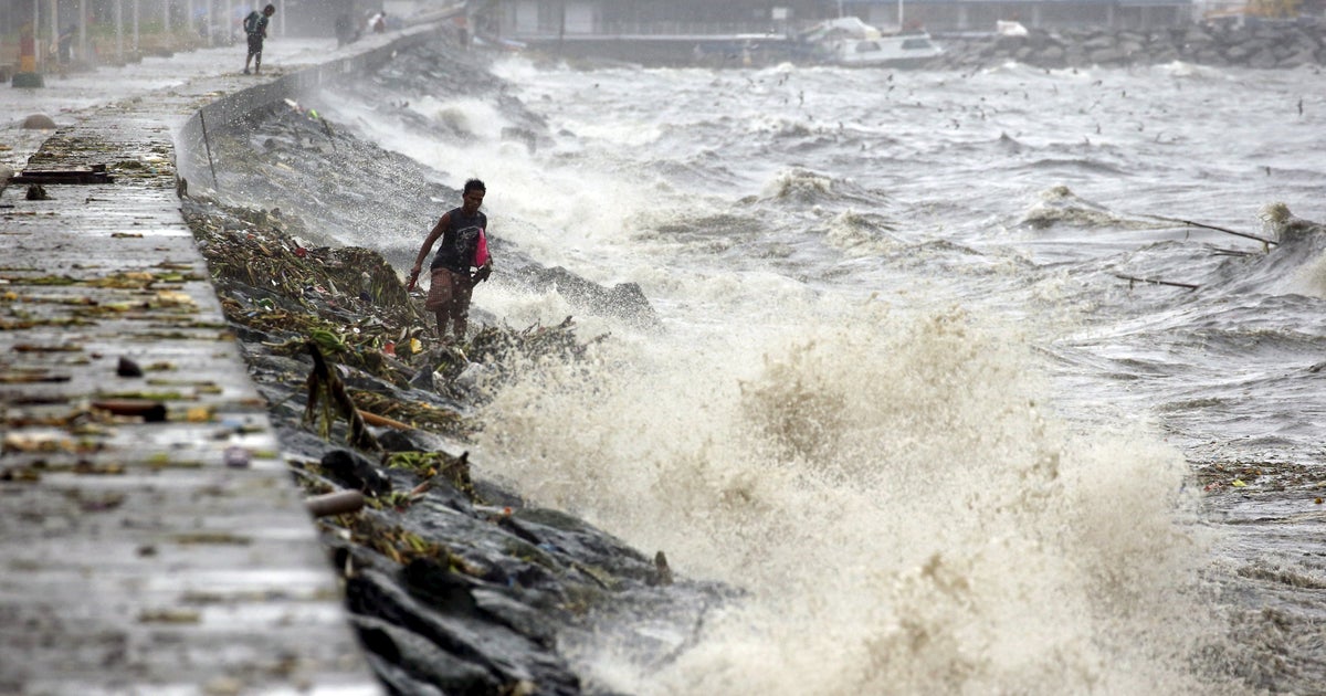 Typhoon leaves 2 dead, thousands displaced in Philippines - CBS News