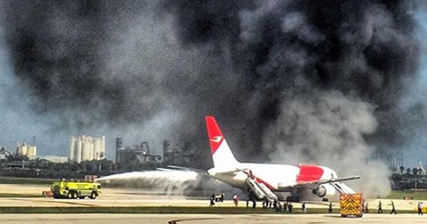 Plane catches fire on runway of Fort Lauderdale airport - CBS News