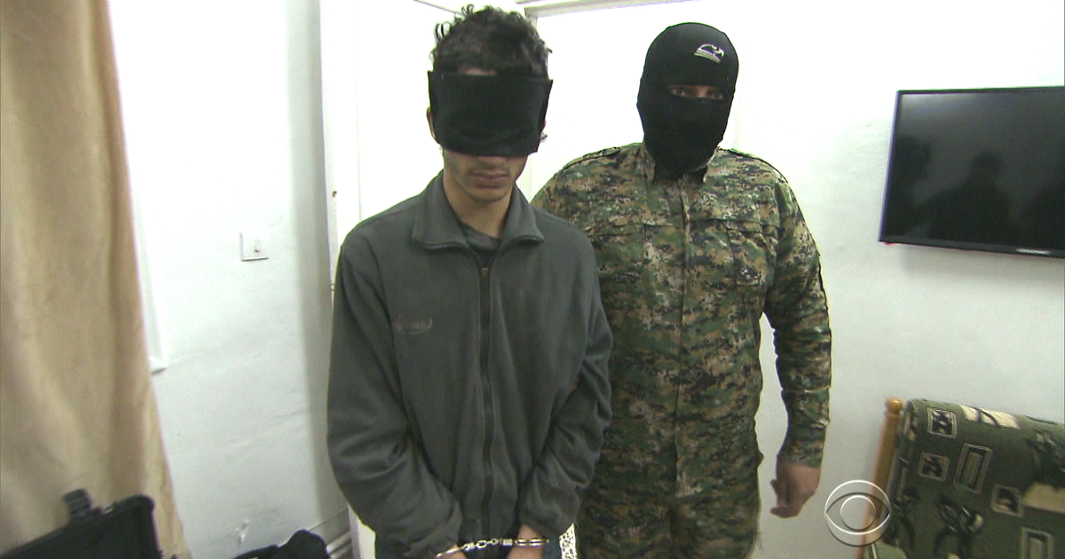 Captured former ISIS fighter says group's actions are "horrific" - CBS News