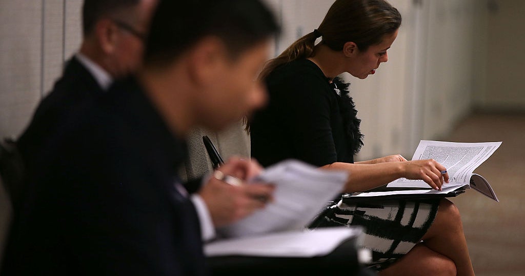 New jobless claims rise but keep record streak intact - CBS News