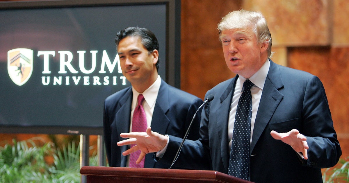Judge approves Trump University settlement deal - CBS News