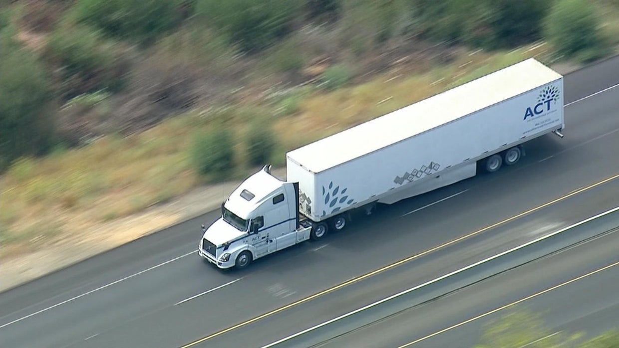 Driver surrenders in Calif. after hours-long police pursuit in stolen big rig - CBS News