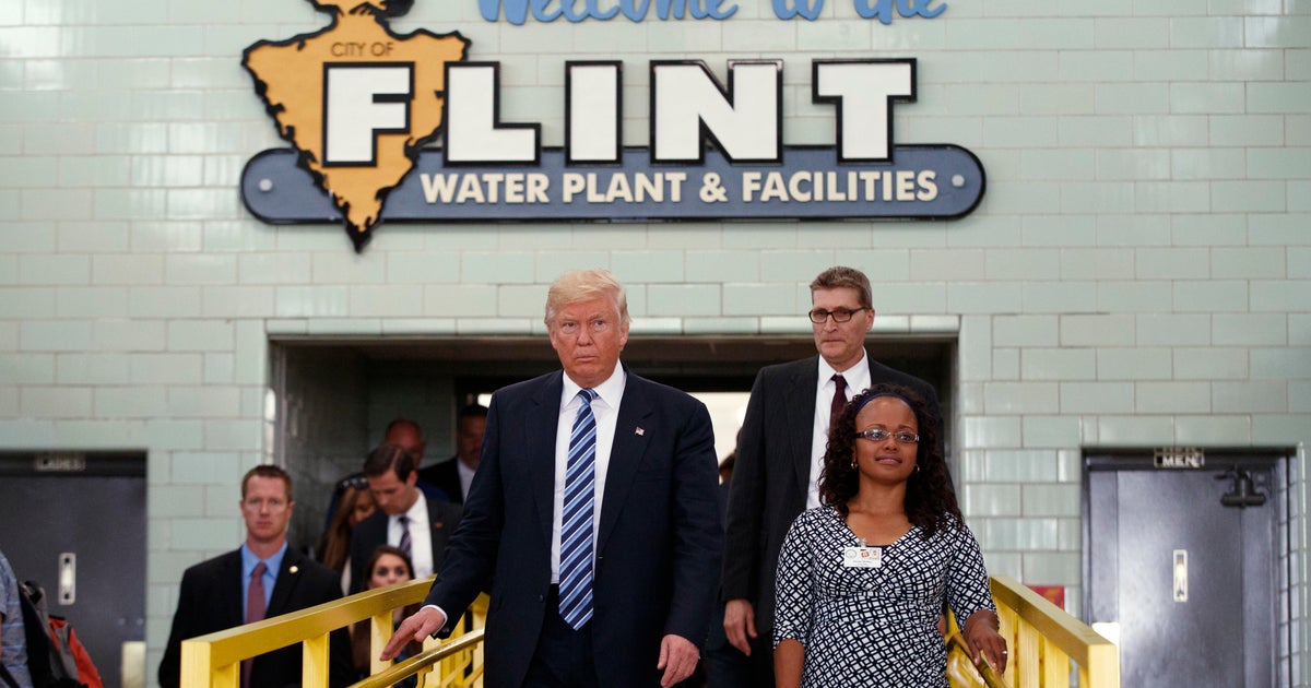In Flint, Trump bashes Clinton, then is cut off - CBS News