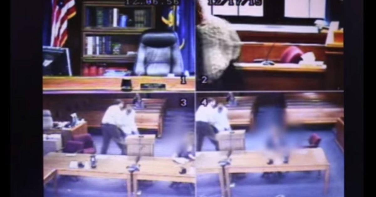 Video shows judge tossing robe, helping restrain defendant in courtroom ...