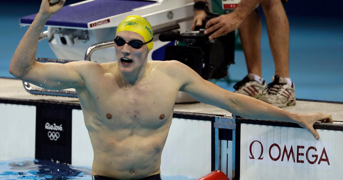 Olympic swimmer thanks fan who spotted concerning mole on chest - CBS News