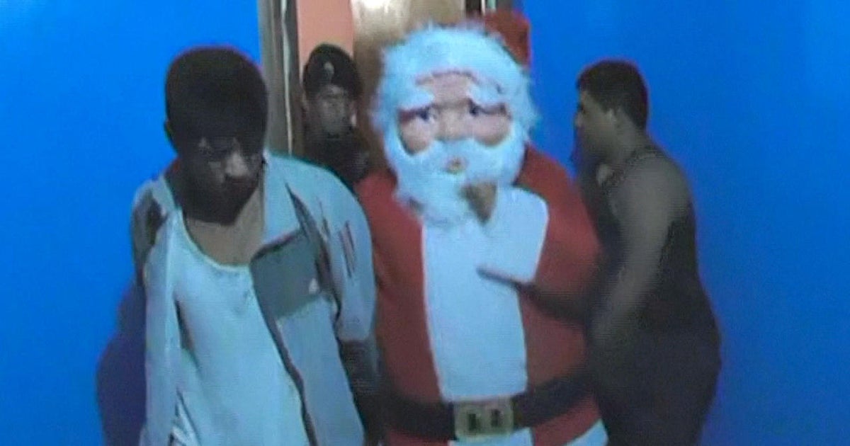 Peru police in Santa suits raid suspected Lima drug distribution center ...