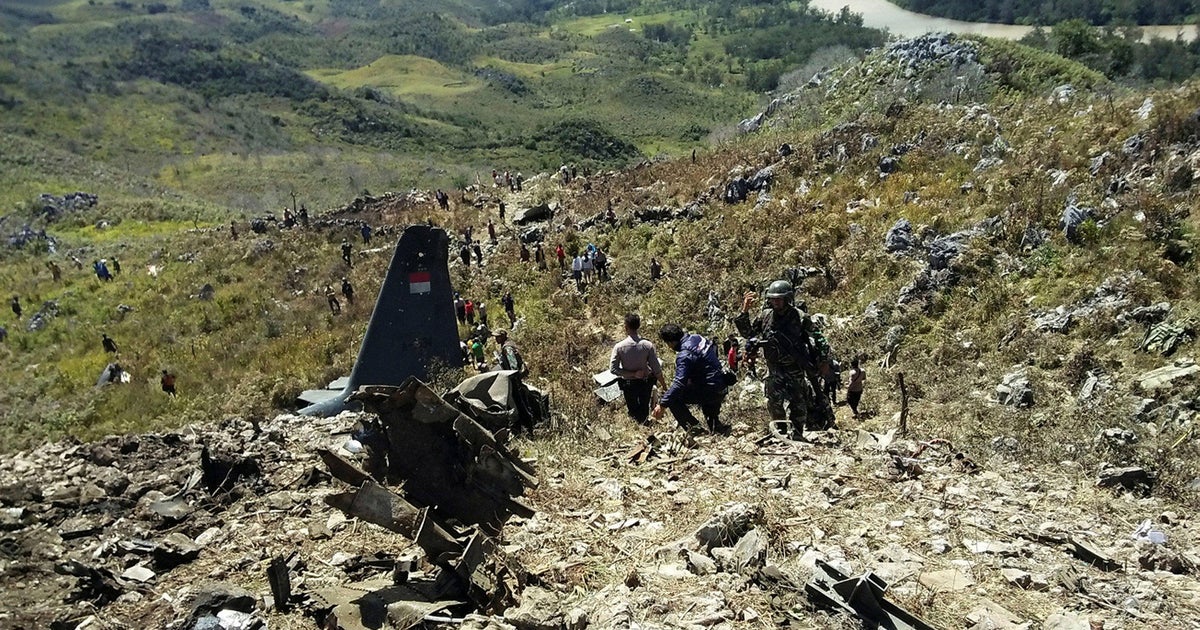 Indonesia military plane crashes in bad weather, killing 13 - CBS News