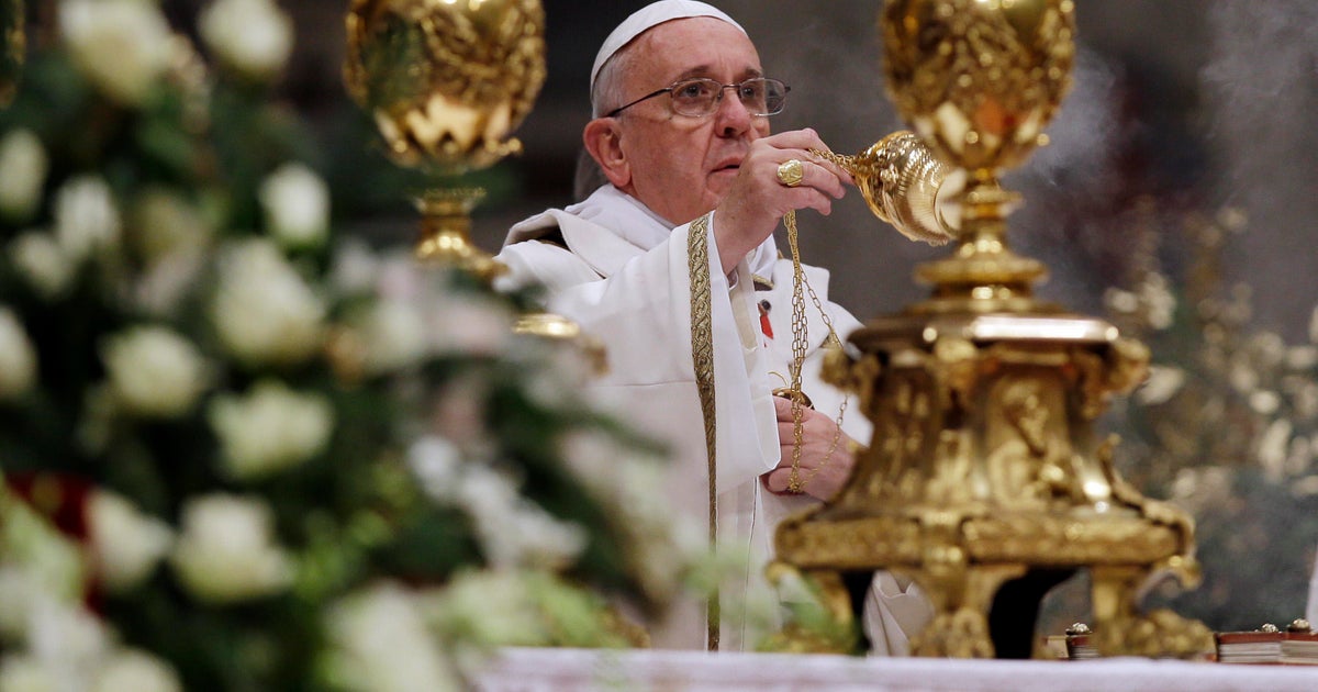 Pope Francis celebrates Christmas Eve Mass in packed St. Peter's ...