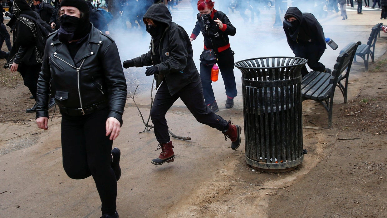 Trump inauguration protest damages parts of downtown Washington - CBS News