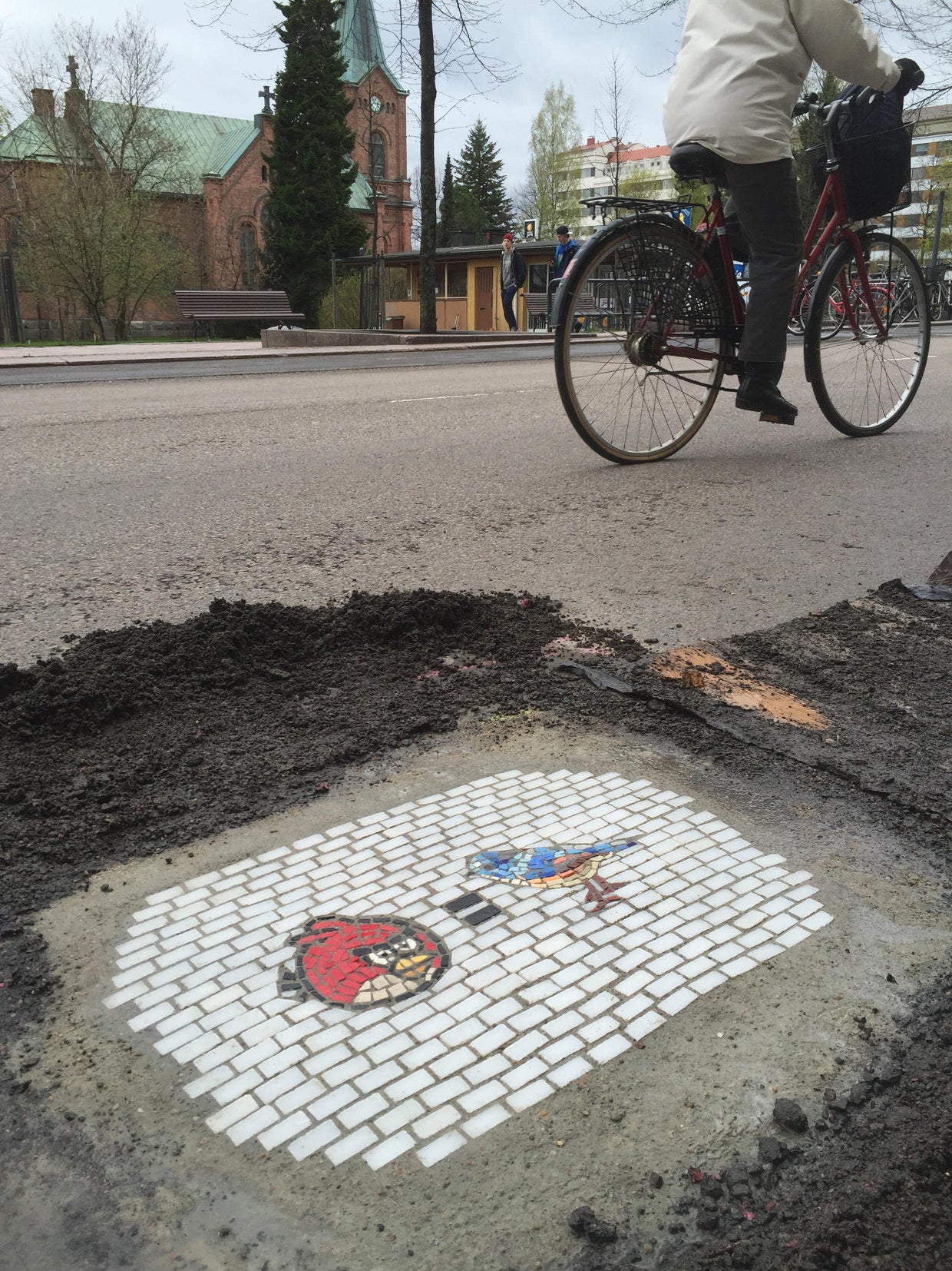 Street art: Jim Bachor's pothole mosaics