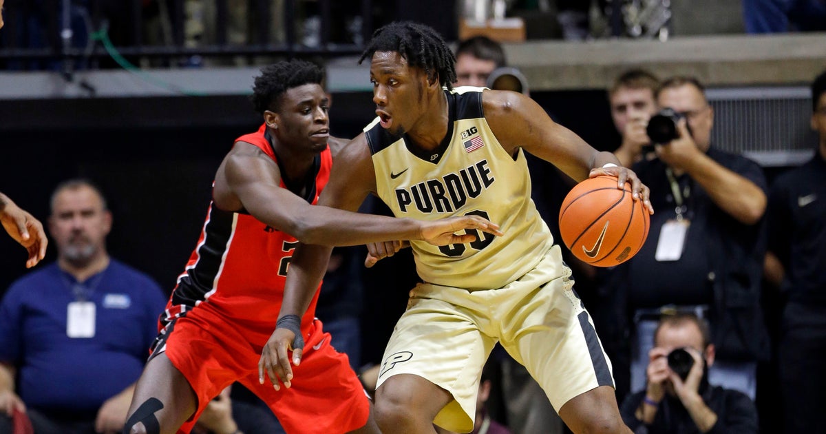 Encouragement helps homeless boy become college basketball star - CBS News