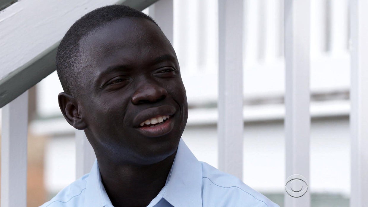 Refugee living out dream job as rookie cop in downtown Atlanta - CBS News