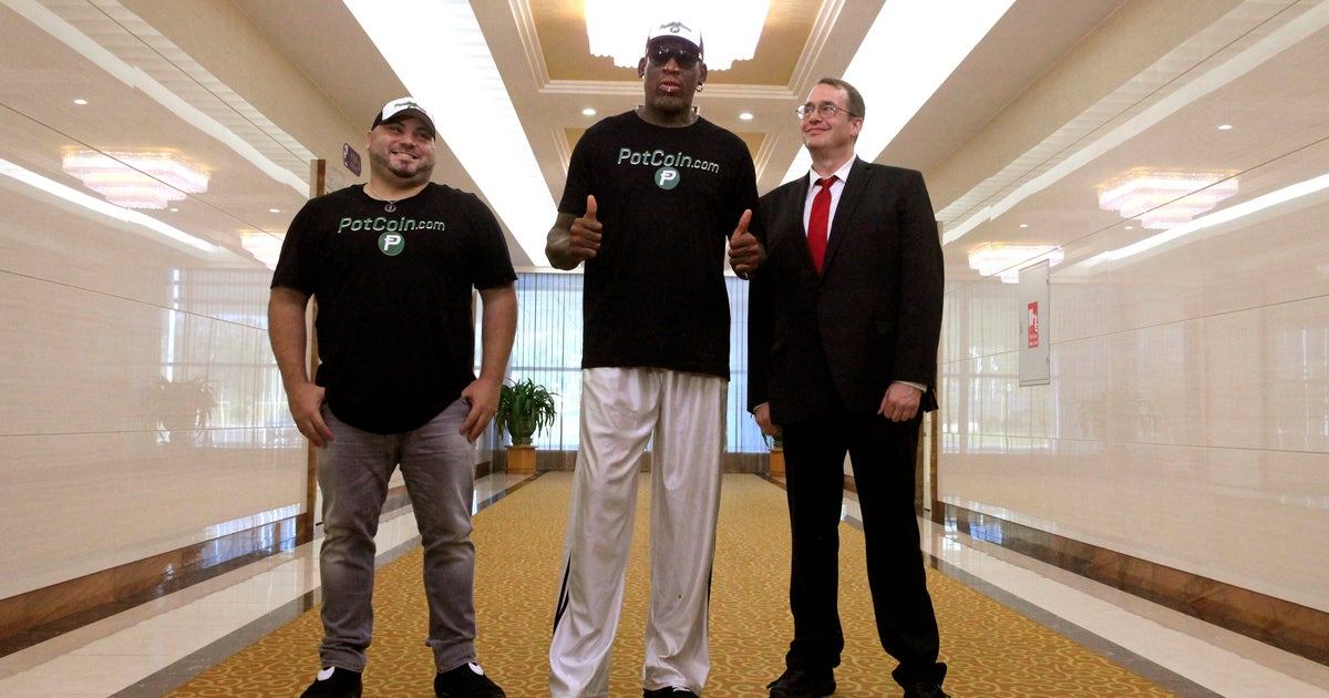 Dennis Rodman flies into North Korea again - CBS News