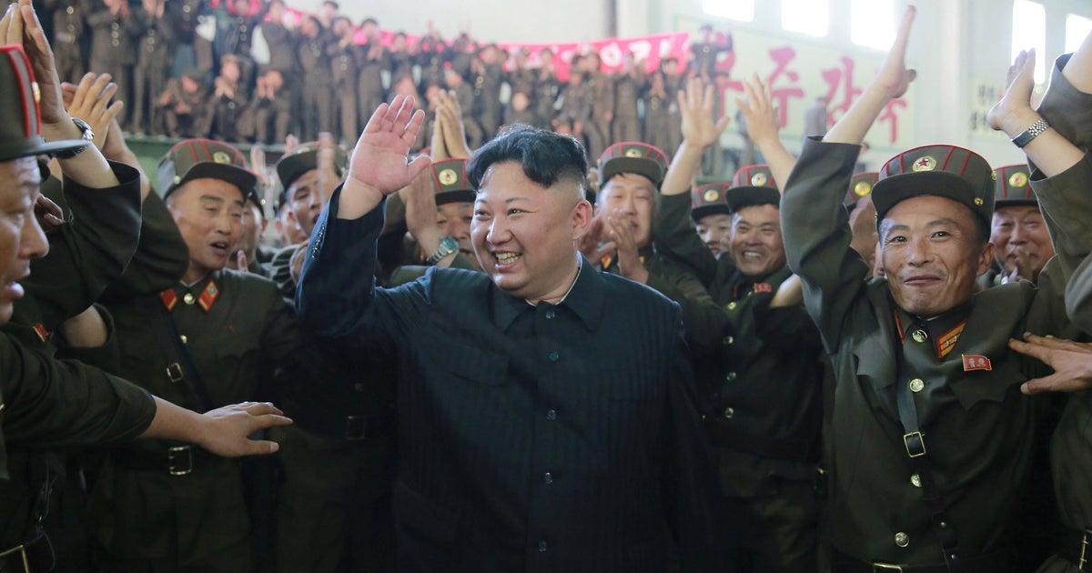 North Korea threatens to attack Guam with "enveloping fire": state-run ...
