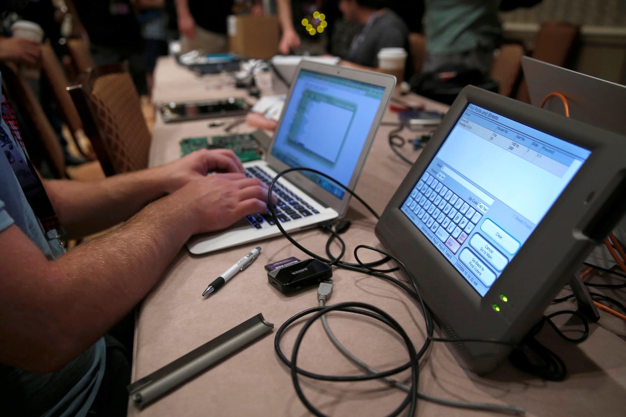 Hackers break into voting machines within 2 hours at Defcon - CBS News