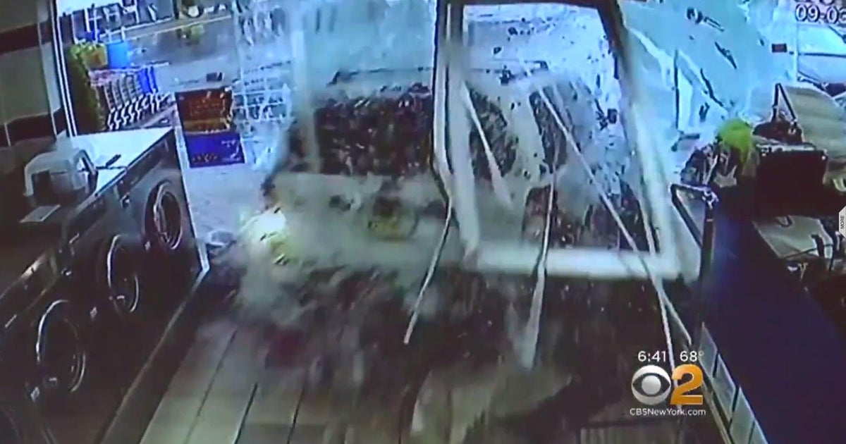 Driver plows through laundromat in apparent accident, injuring 6 - CBS News