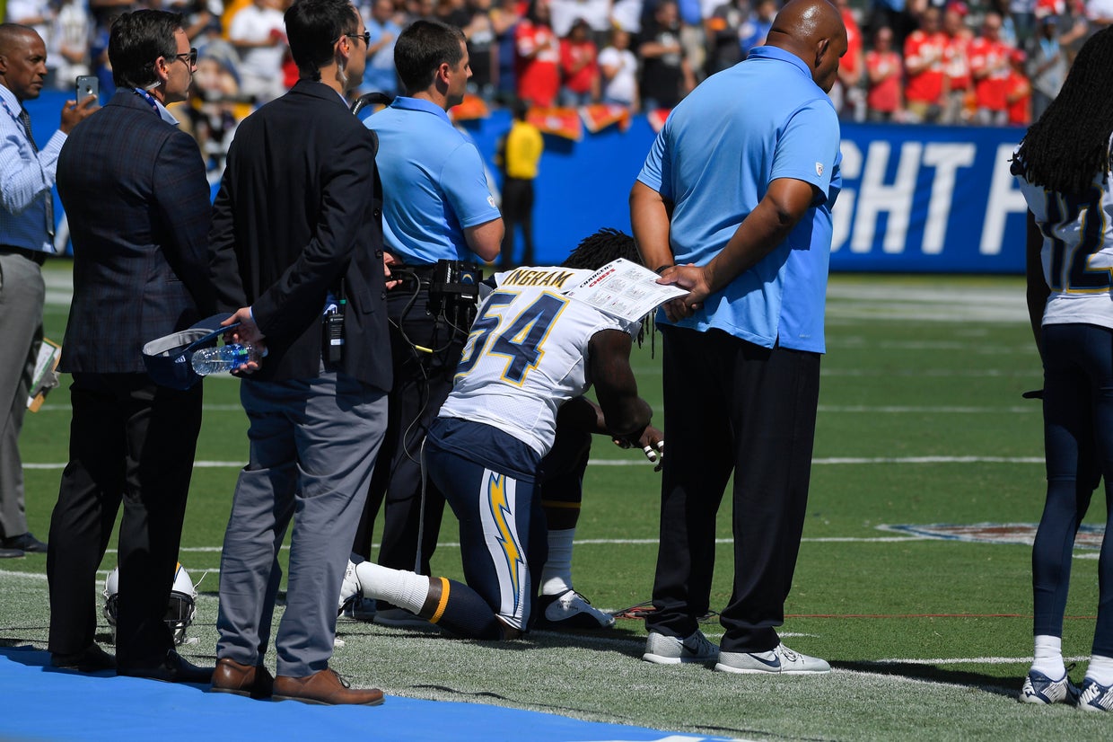 NFL players kneel, raise fists, lock arms during national anthem - CBS News