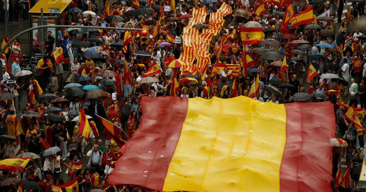 Catalonia separatists vow to defy police ultimatum over vote - CBS News