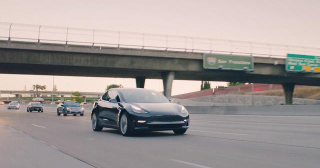 What's behind automakers' push for electric cars? - CBS News
