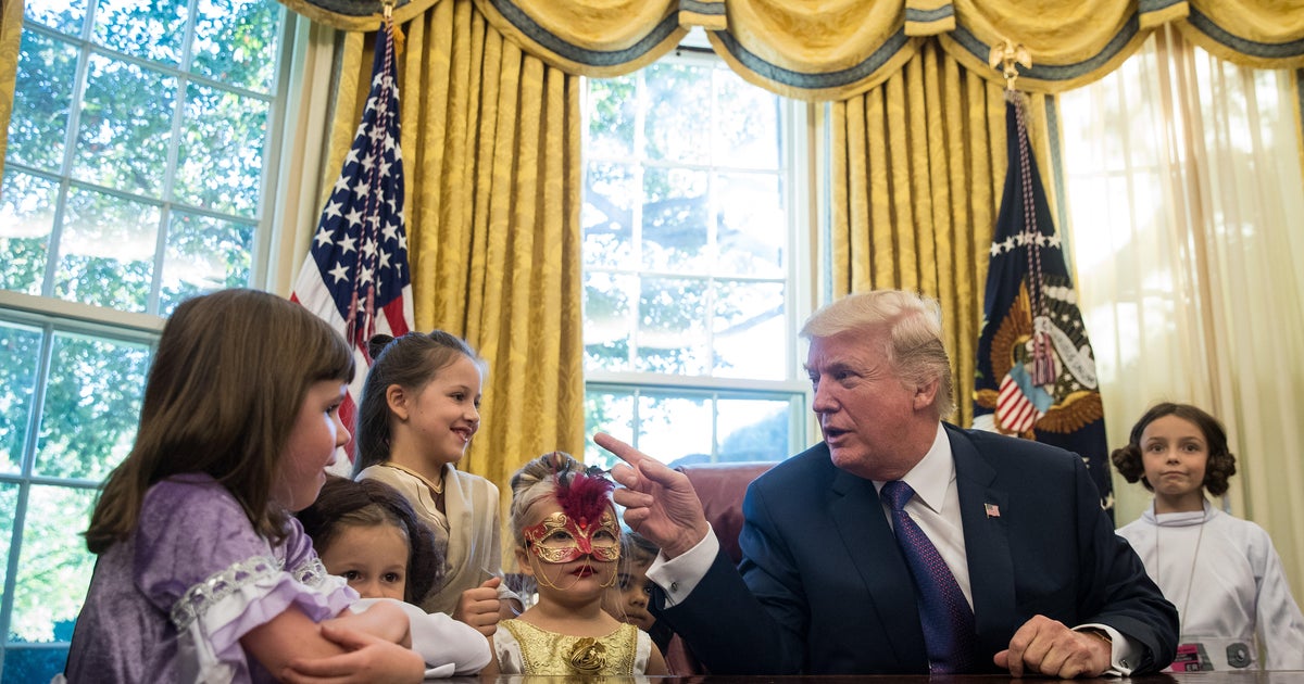 Here's what happened when Trump invited reporters' kids in costume into ...