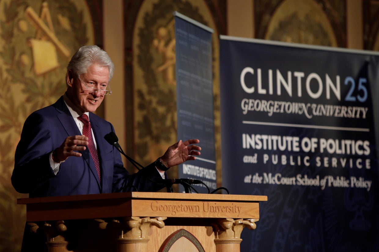 President Bill Clinton delivers a speech at Georgetown University - CBS ...