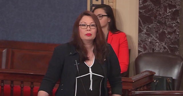 Senator calls Trump "draft dodger" in fiery speech - CBS News