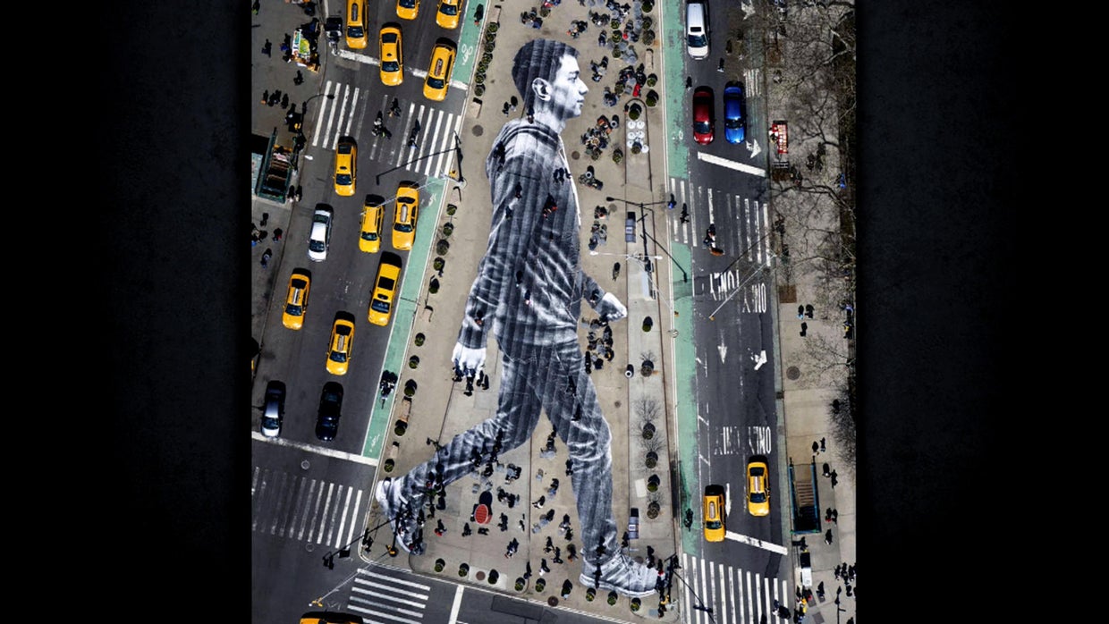Larger than life displays by French photographer JR - CBS News