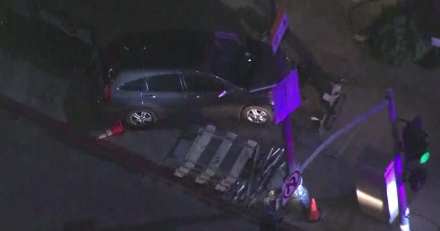 Dramatic L.A. car chase ends with driver jumping sidewalk, narrowly ...