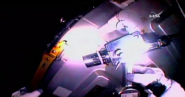 Astronauts make space station repairs in lengthy spacewalk - CBS News