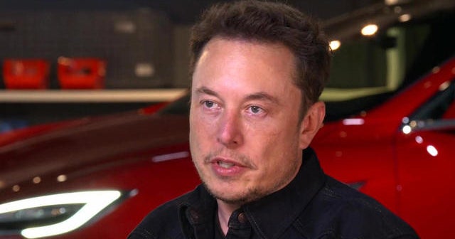 Tesla CEO Elon Musk offers rare look inside Model 3 factory - CBS News