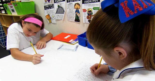 Students connect with seniors through letters in cursive - CBS News