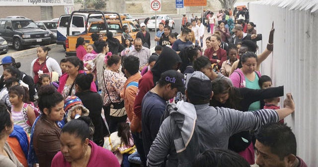 Backlog of immigration cases causing major processing delays - CBS News