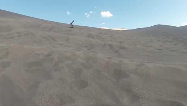 Sandboarding: Hitting slopes of sand - CBS News