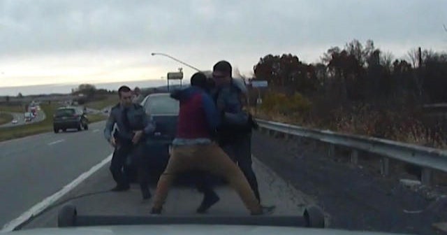 Dashcam video shows moment of near-fatal police shootout - CBS News