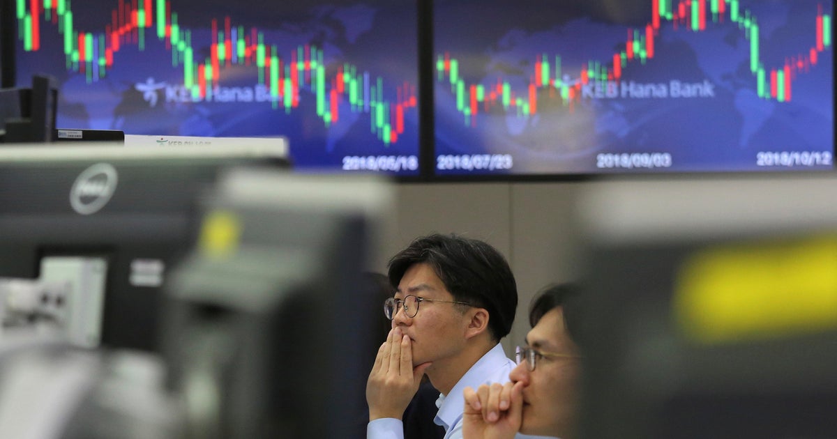 Asian stock markets stem bleeding left behind by Wall Street - CBS News