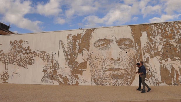 Lisbon street artist Vhils: Scraping and carving art into cityscapes ...