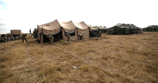 Inside Trump's military border base: Endless barbed wire, Humvees and a ...